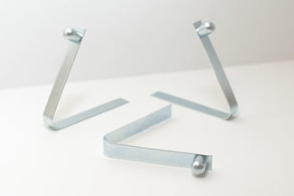 Button Clips are used for adjusting height. The button locates within a ...